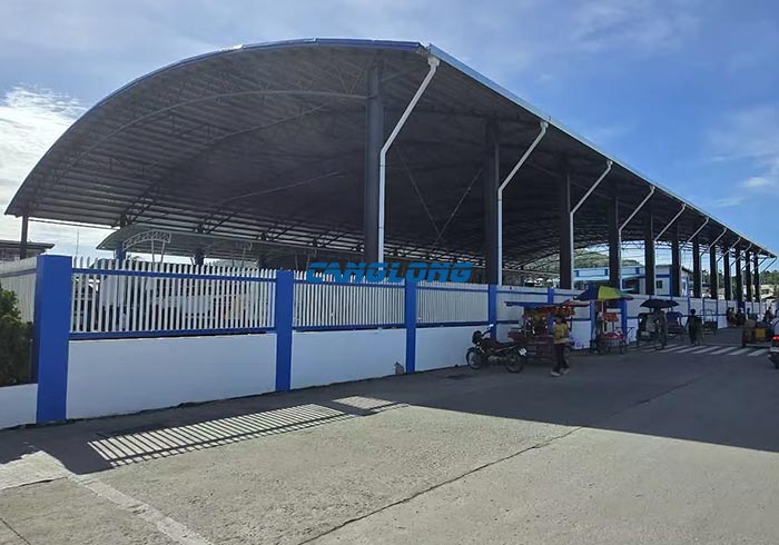 Steel truss curved exhibition hall in Gabon | Steel Structure Manufacturer